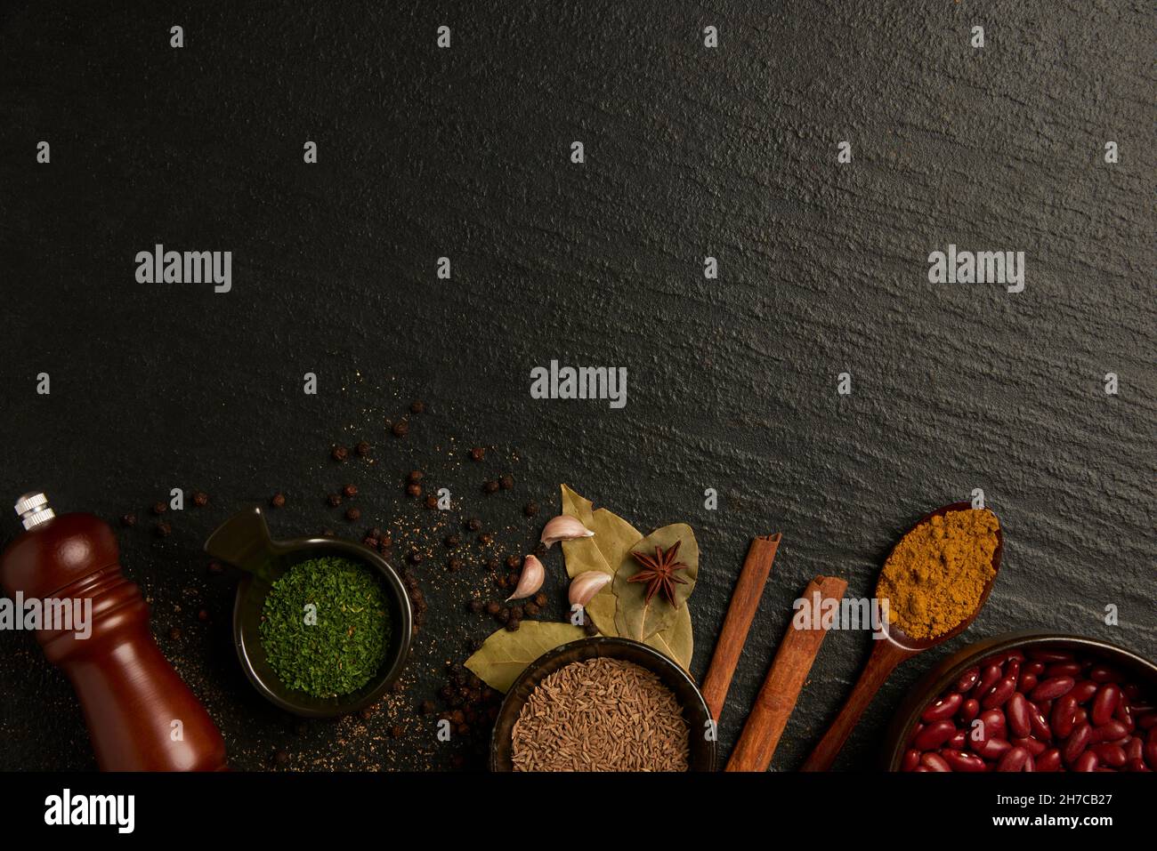 spices concept different colors and types of spices in bowls, and some ...