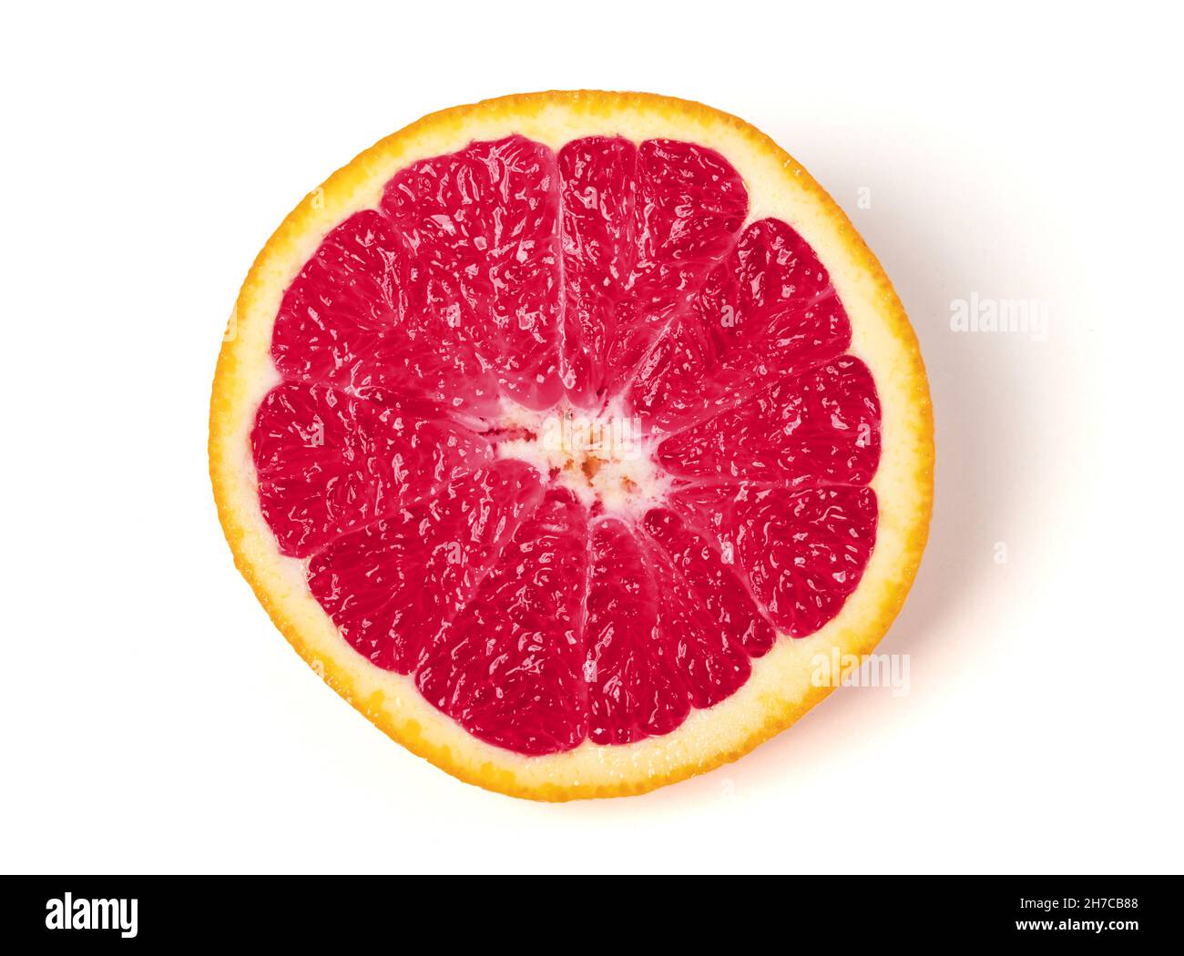 Weird looking cut of orange fruit, isolated Stock Photo - Alamy