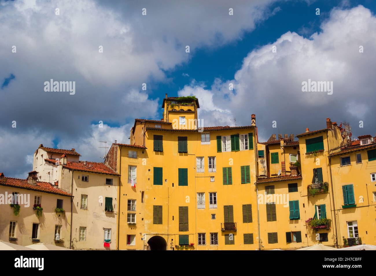Lucca Amphitheater characteristic medieval houses with clouds Stock ...