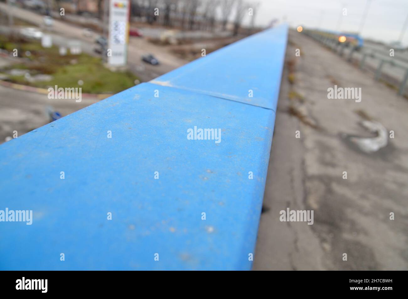 Blue scratchy parapet, bridge railing close view Stock Photo - Alamy