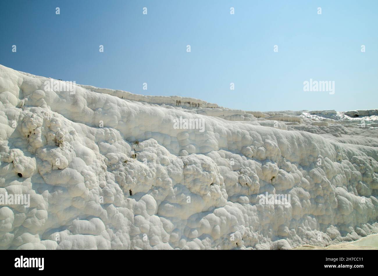 Magnificent walls of Pamukkale, Turkey. White walls background Stock ...