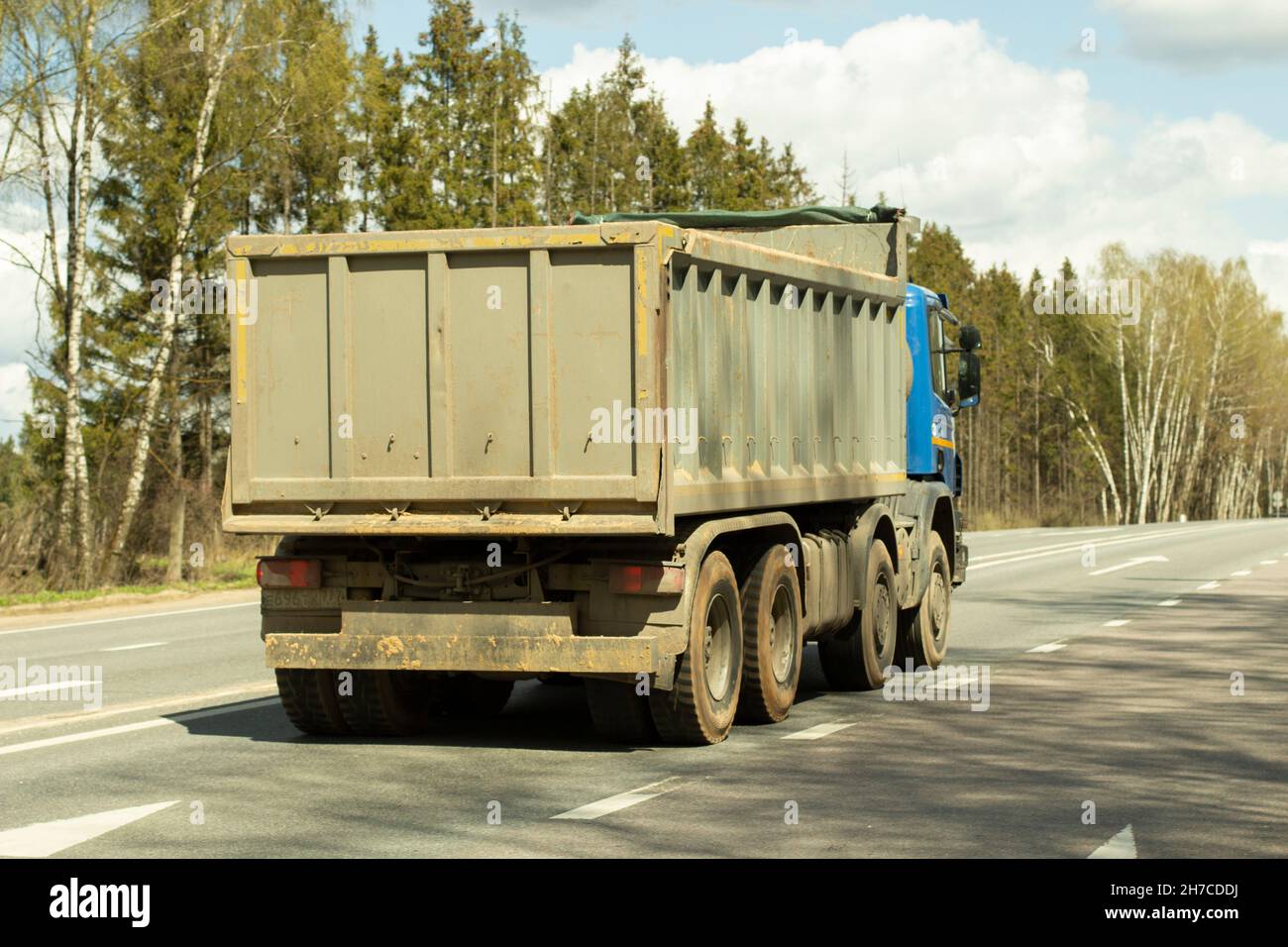 Freight transport on the highway. A truck is driving down the road ...