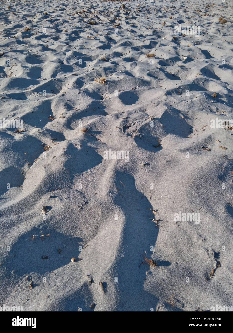 Vertical shot of sand texture in a beach Stock Photo - Alamy