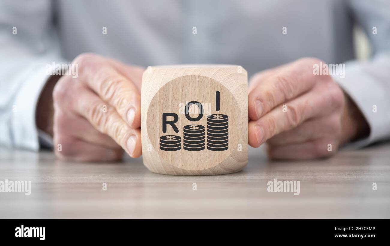 Wooden block with symbol of roi concept Stock Photo - Alamy
