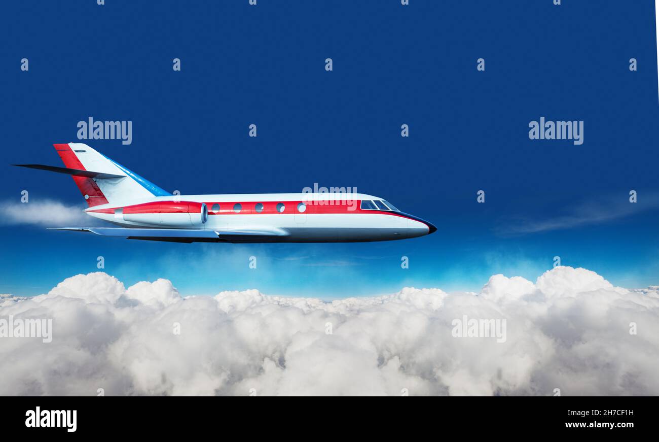 Medium jet plane fly above clouds side view Stock Photo - Alamy