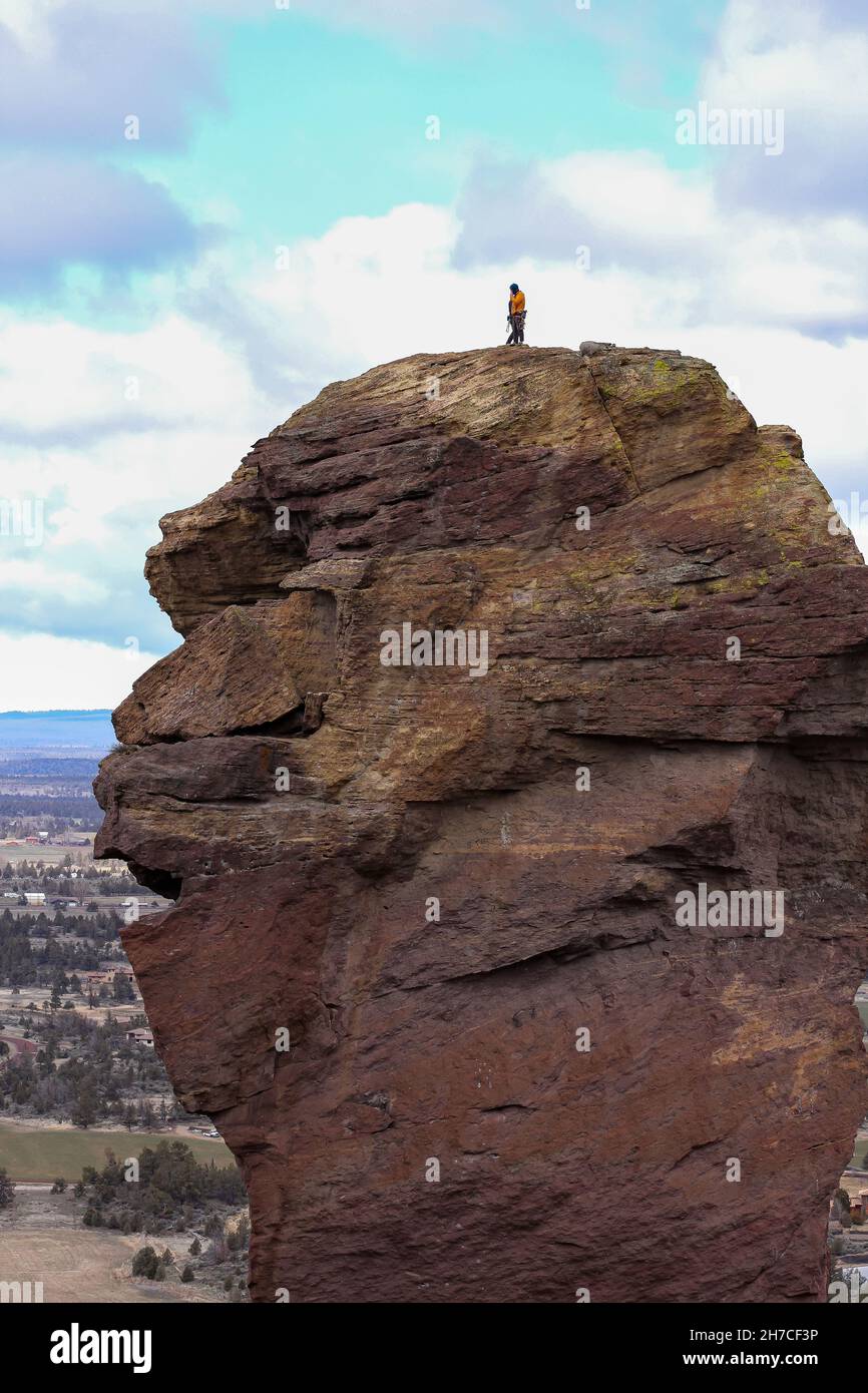 Vertical shot of a climber on a Monkey Face at Smith Rock State Park ...