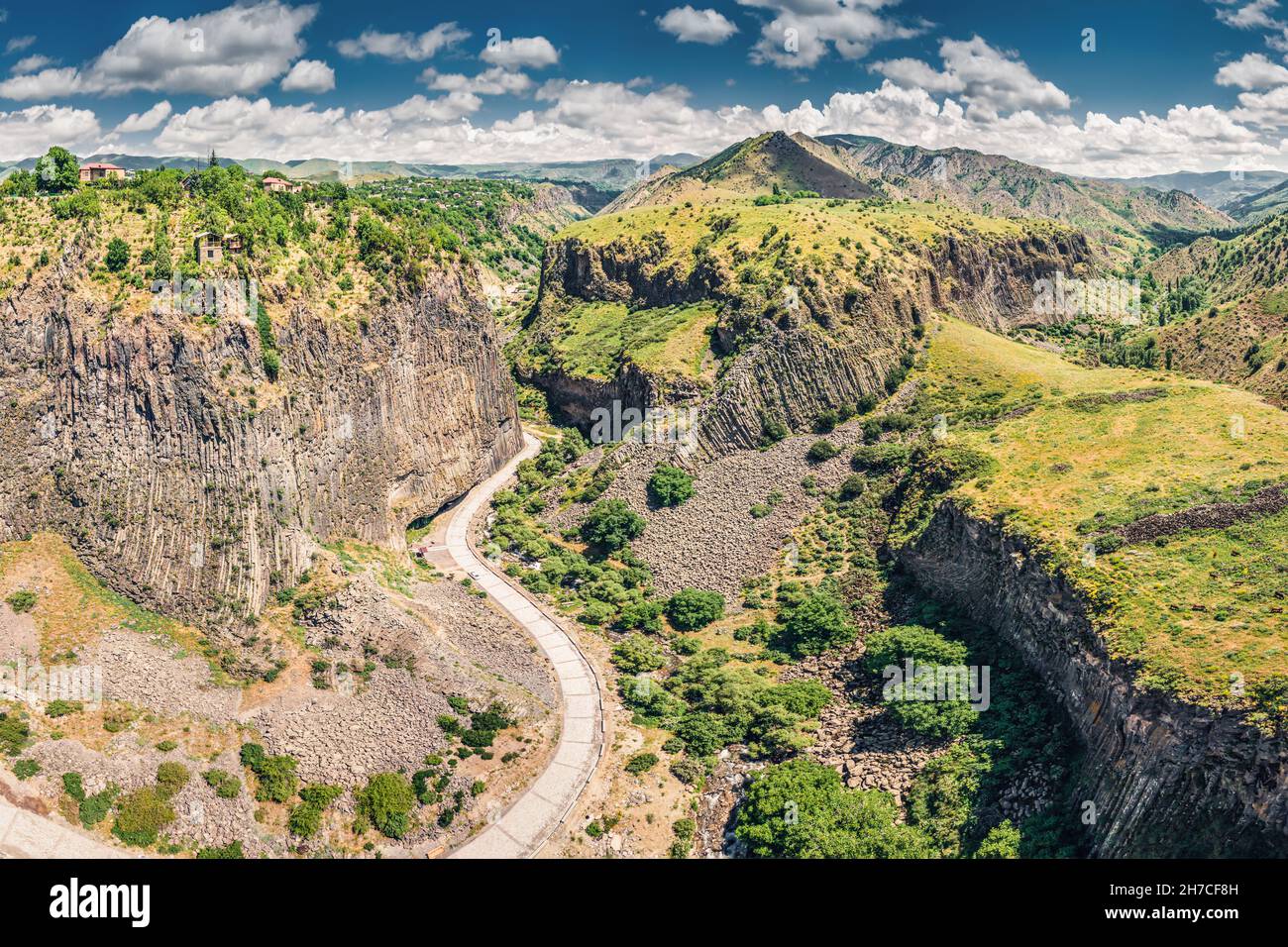 Car road and a pedestrian path leading to majestic gorge of Azat river ...