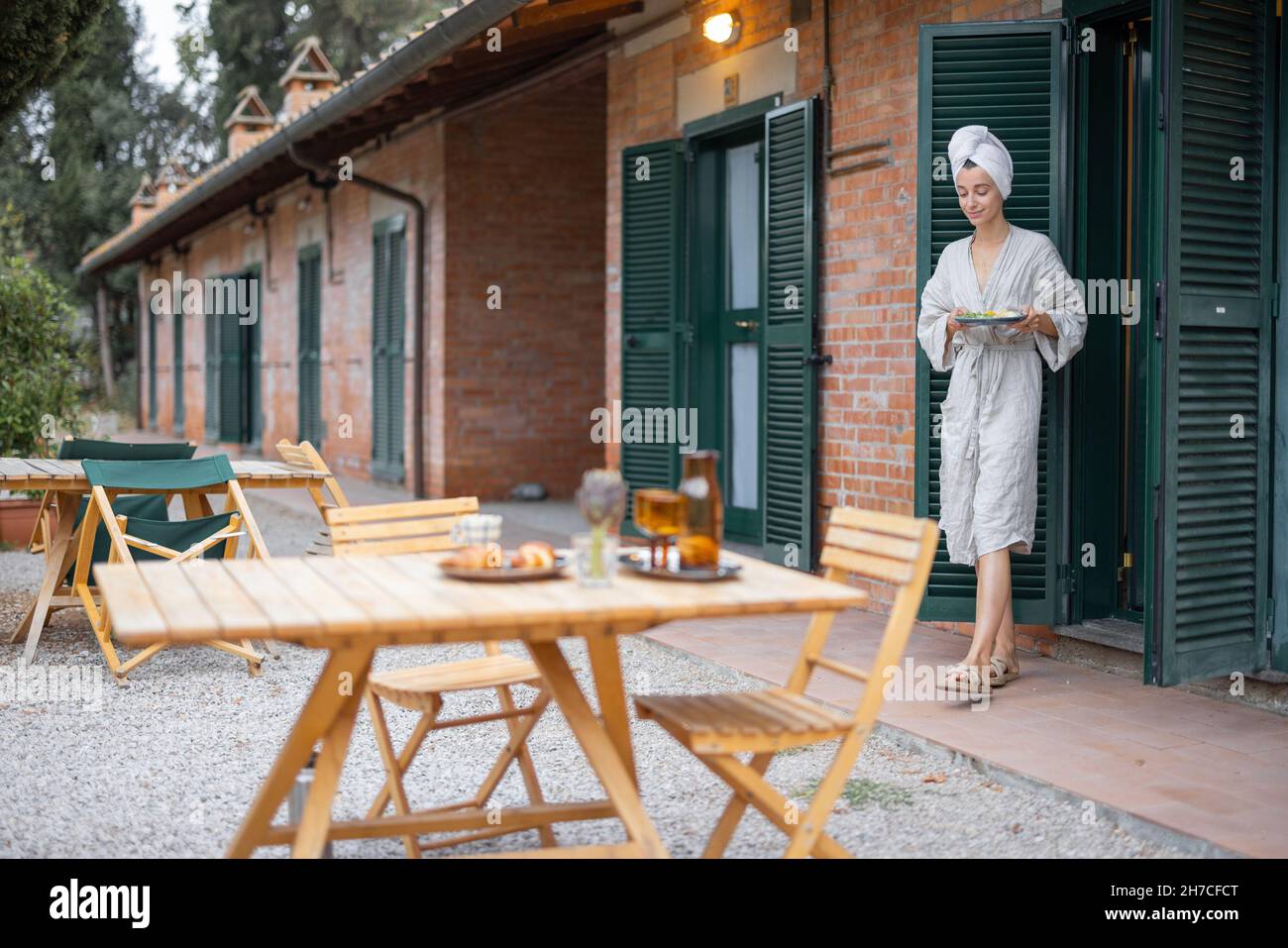 Woman carry food to table for breakfast at morning Stock Photo - Alamy
