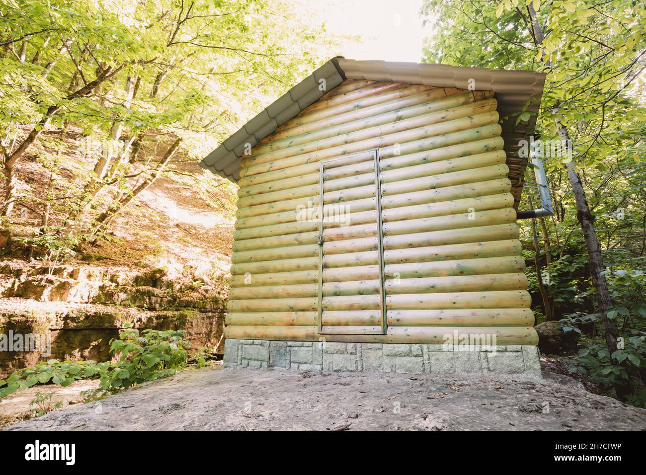 Wooden house in nature park for hikers recreation. Ecological camping ...