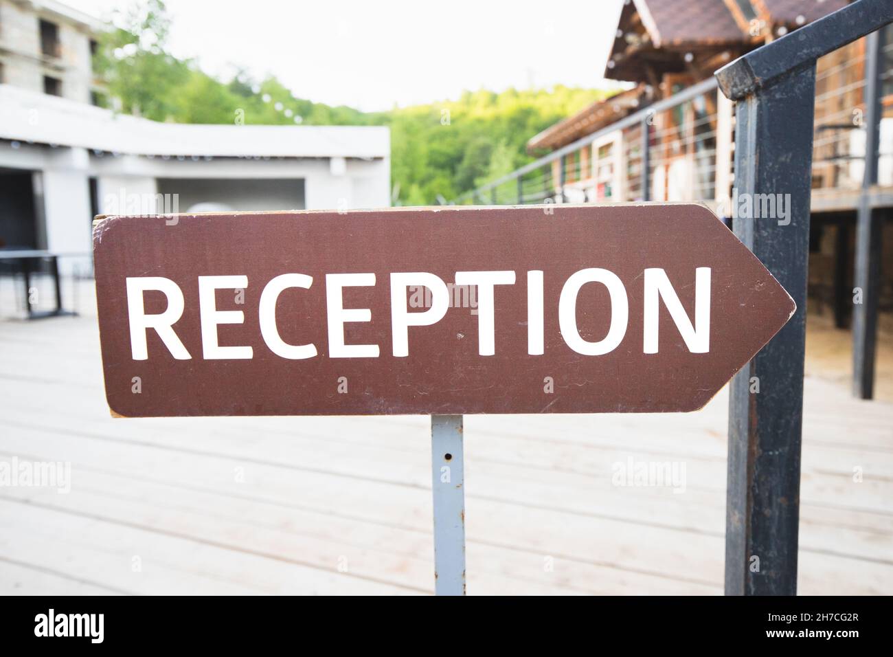 A sign with the inscription reception, indicating the entrance to the ...