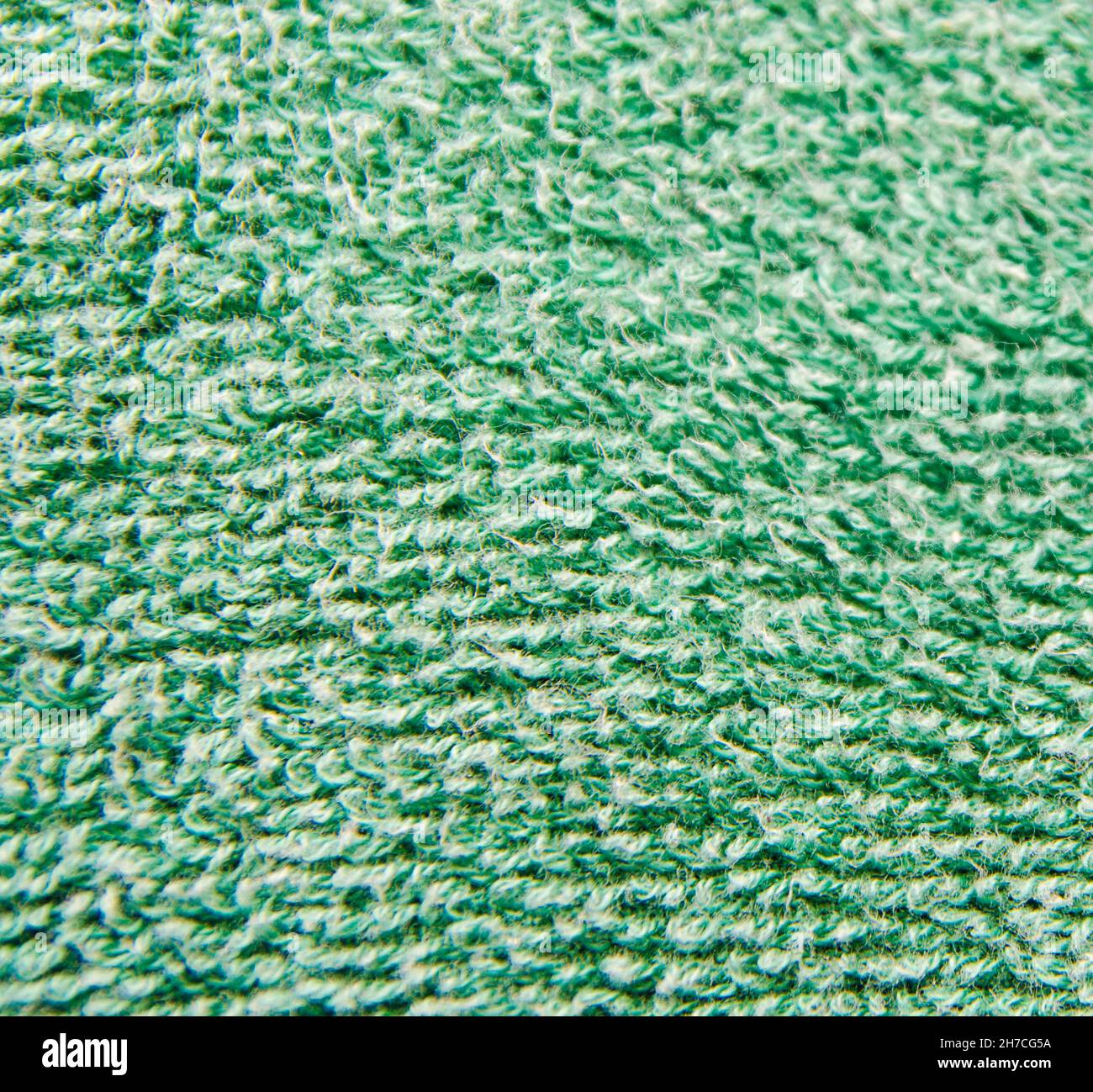 Green fluffy cloth texture, close macro view Stock Photo - Alamy