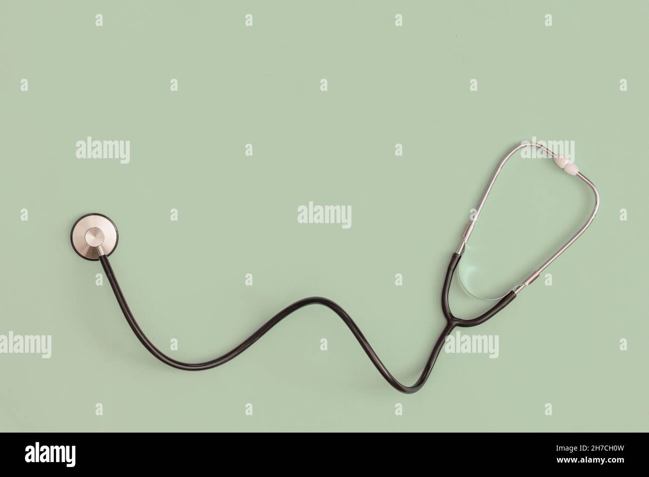 Stethoscope on green background. Top view. Flat lay. Medicine concept ...