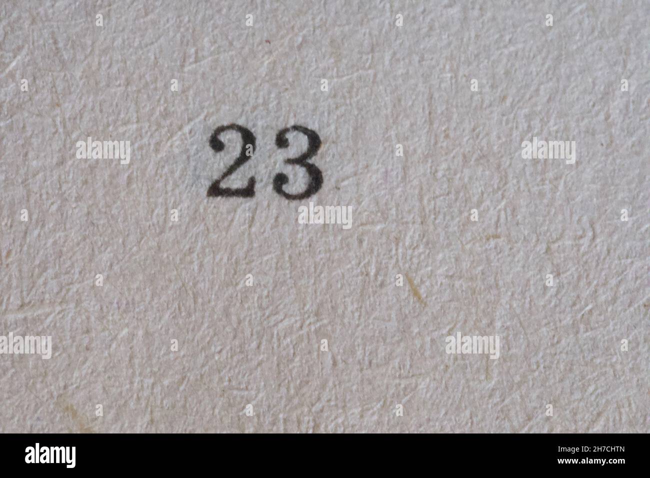 The number 23 printed on a piece of paper. Paper texture Stock Photo ...