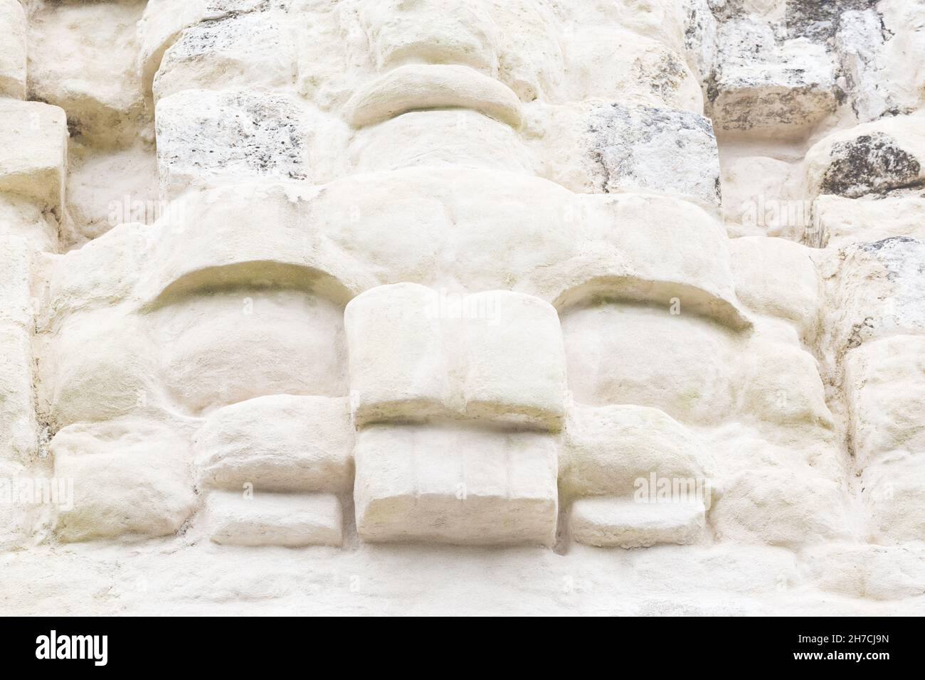 Guatemala, Tikal, : Close-up of the mask carvings on Mayan Temple II ...