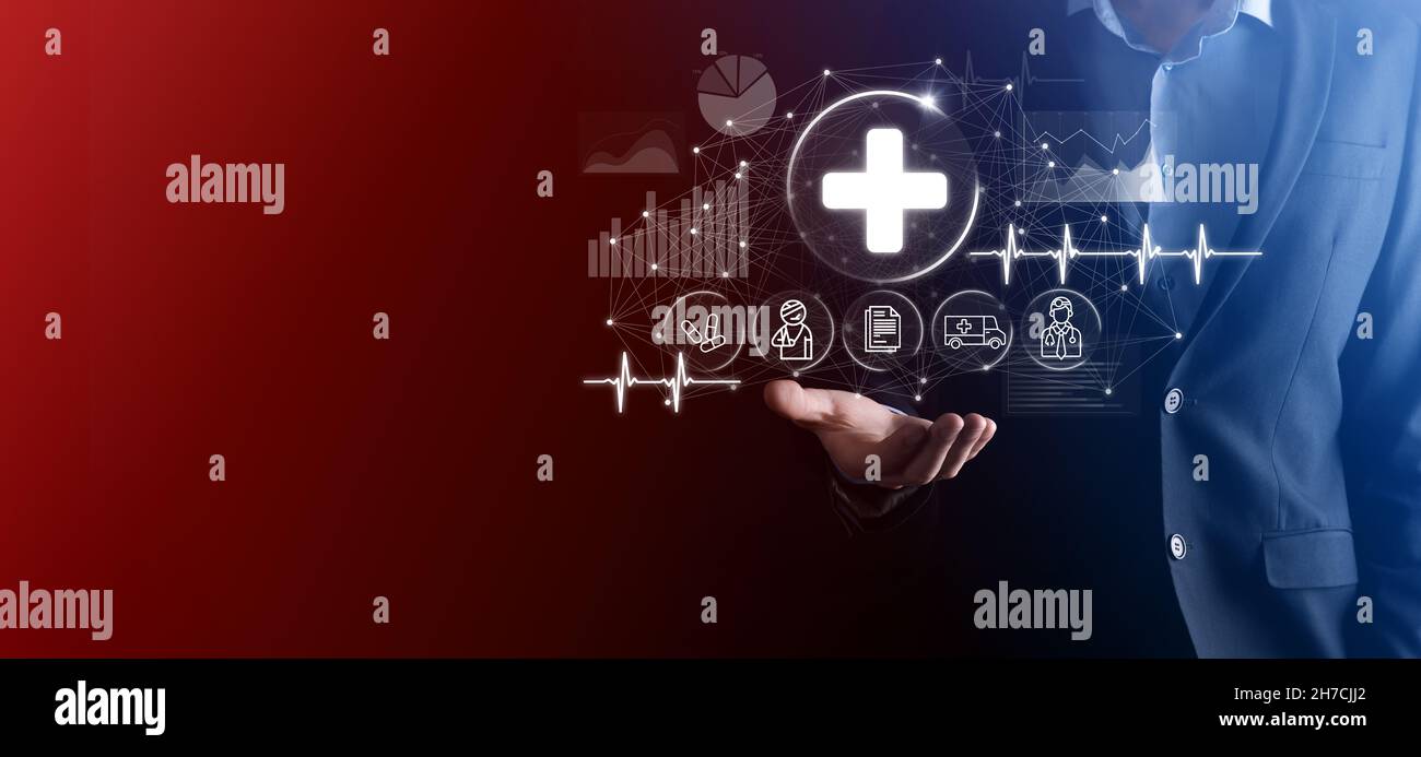 Businessman hold virtual plus medical network connection icons. Covid ...