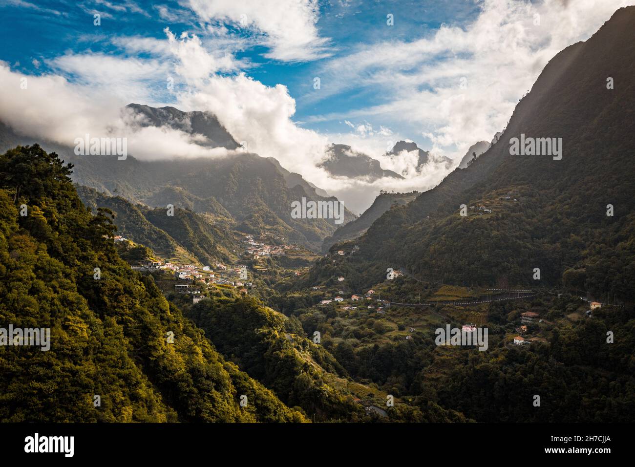 Cloudy sky over the mountains of Madeira, Portugal on a sunny day Stock ...