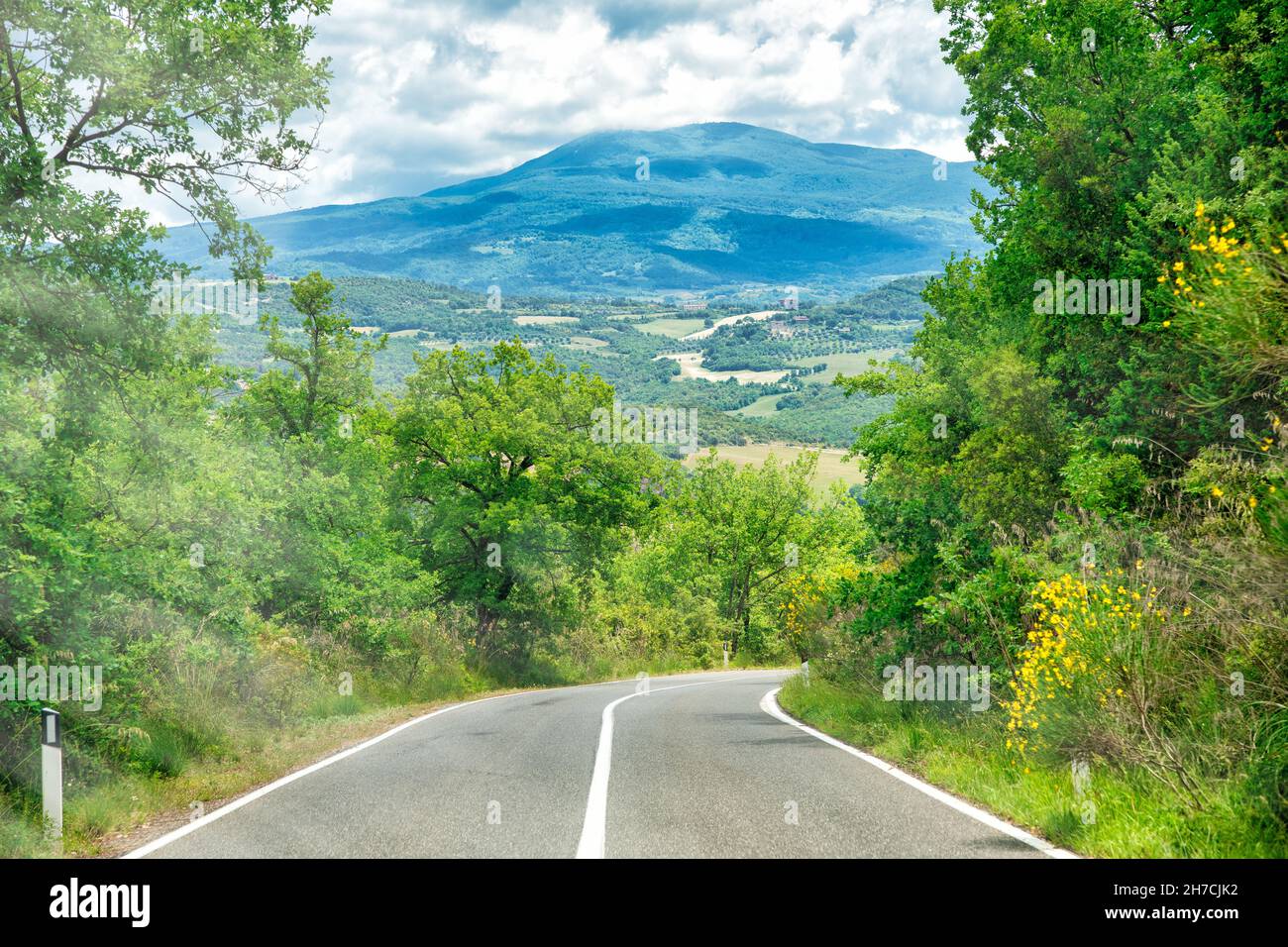 Beautiful road across Tuscan countryside, Italy in spring season Stock ...