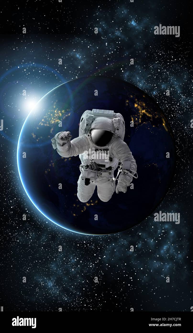 Astronaut in outer open space over the planet .Stars provide the ...