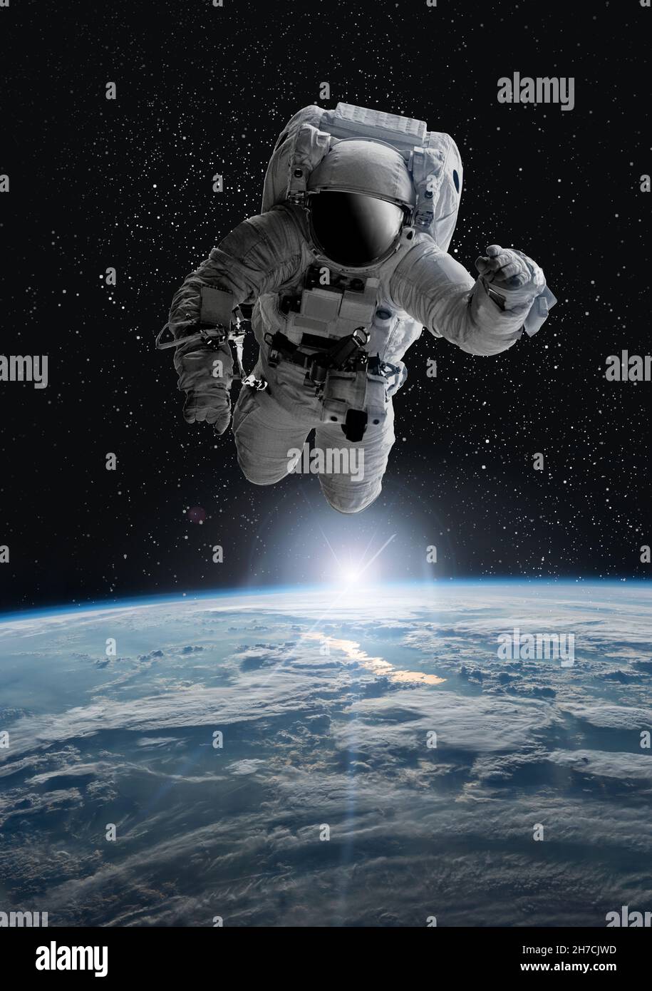 Astronaut in outer open space over the planet Earth.Stars provide the ...