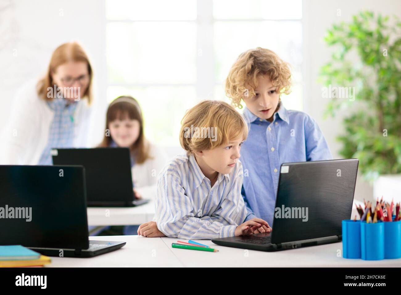 Children laptop tablet class hi-res stock photography and images - Alamy