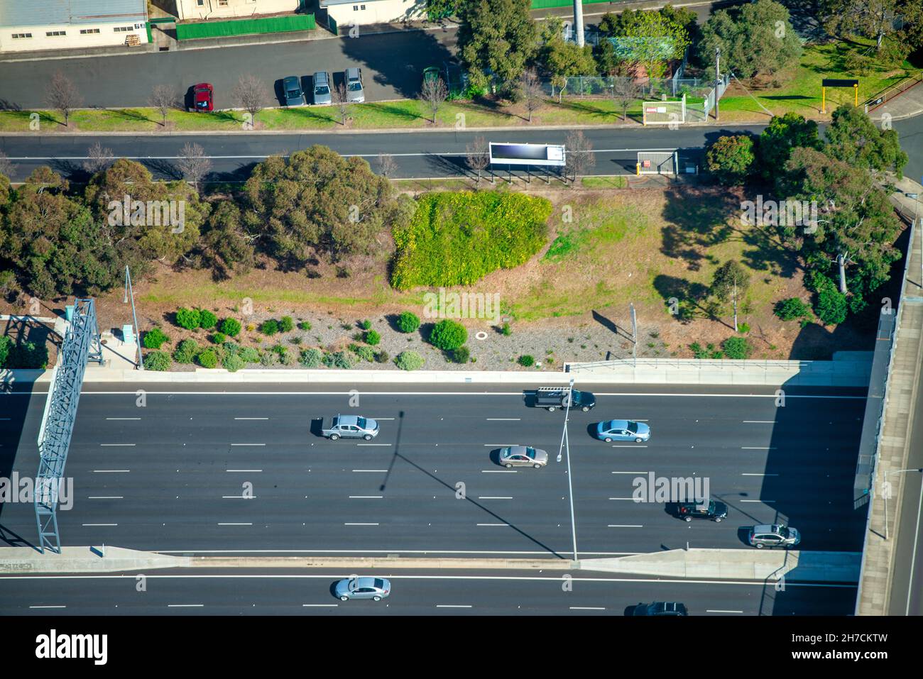 Detail of modern interstate on a sunny day with car traffic, overhead ...