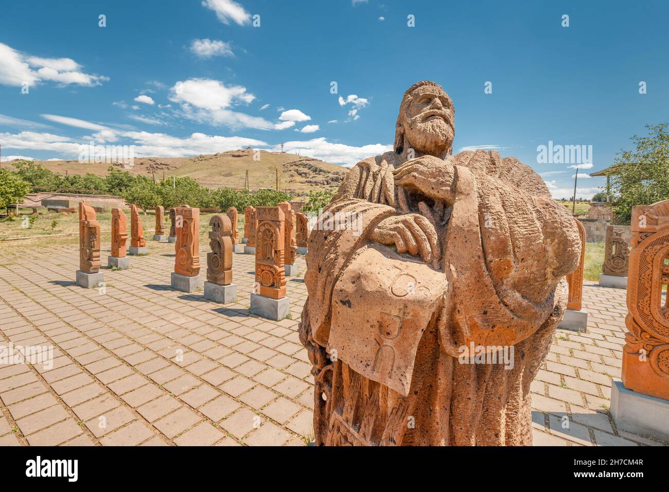 19 May 2021, Oshakan, Armenia: Statue of Mesrop Mashtotts with ...