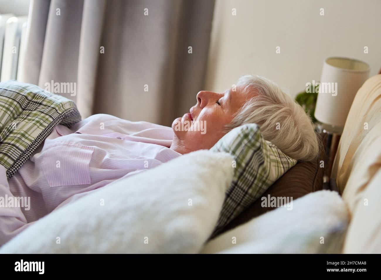 Old woman in sick bed hi-res stock photography and images - Alamy