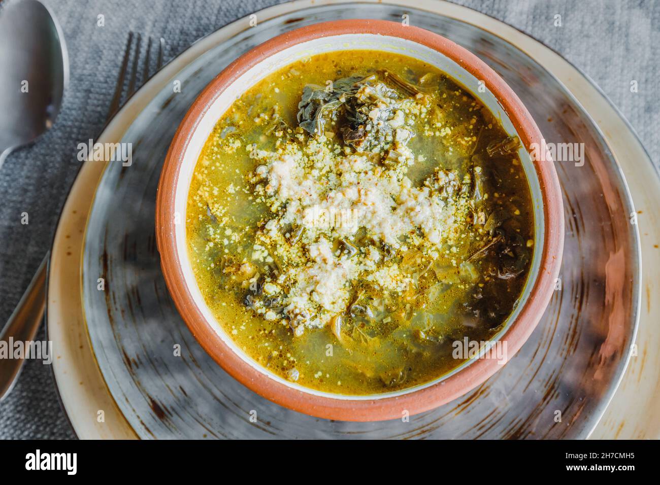Traditional Armenian herbal soup with aveluk or horse sorrel. The ...