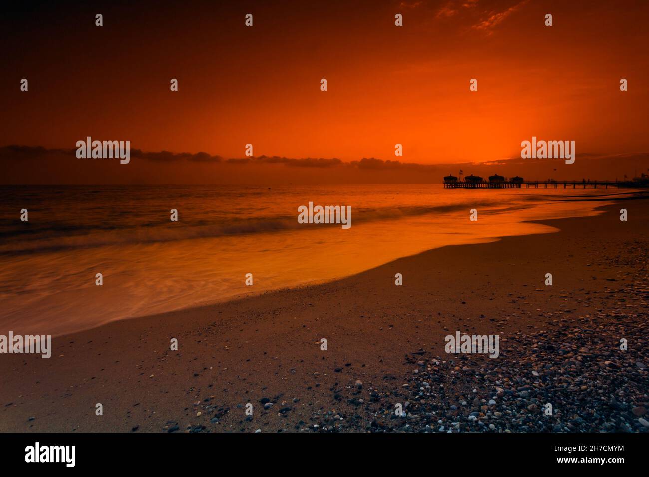 Beautiful sunset on the beach in Turkey Stock Photo - Alamy