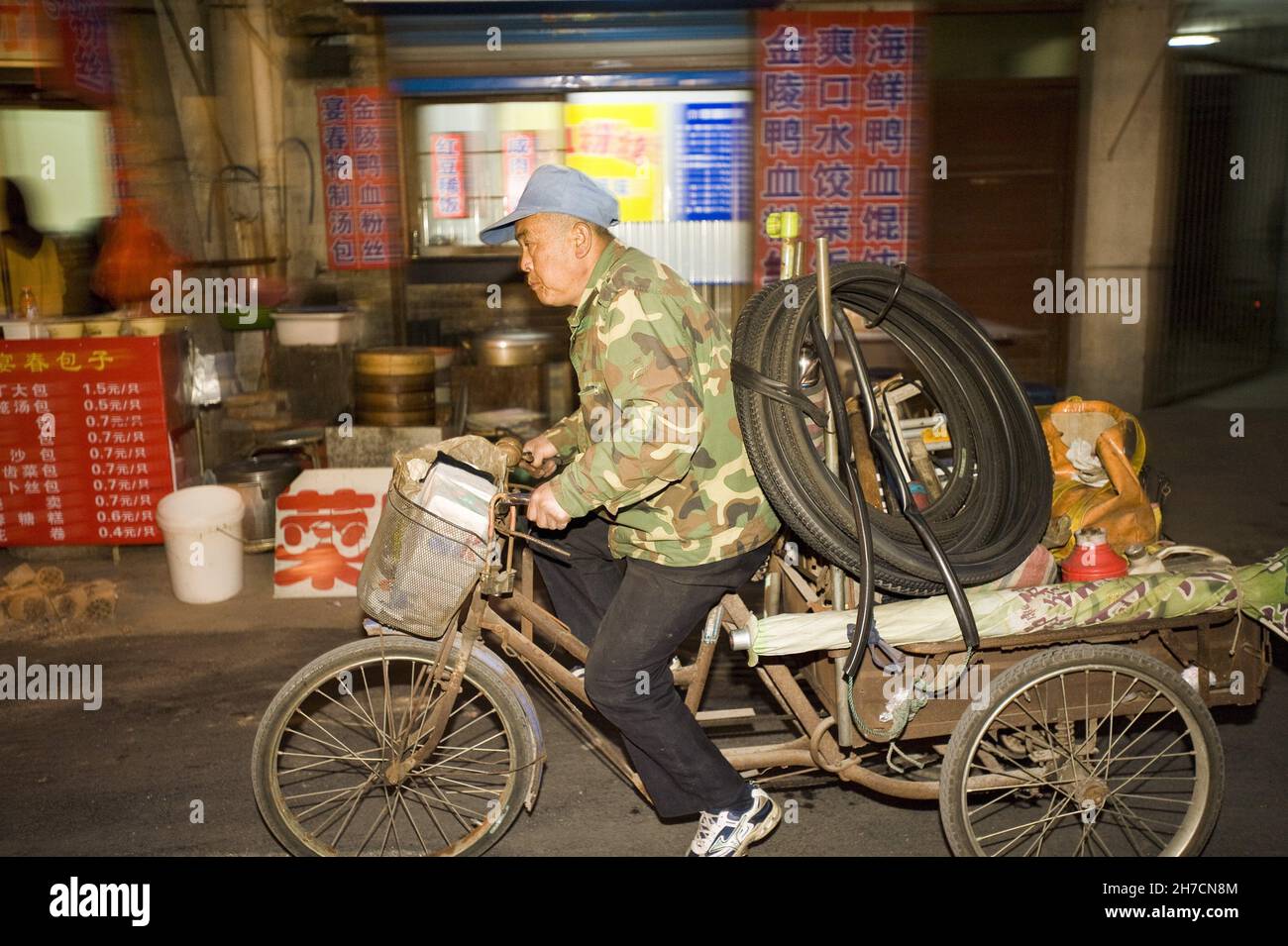 Loaded cargo bicycle with driver, China, Suzhou Stock Photo - Alamy