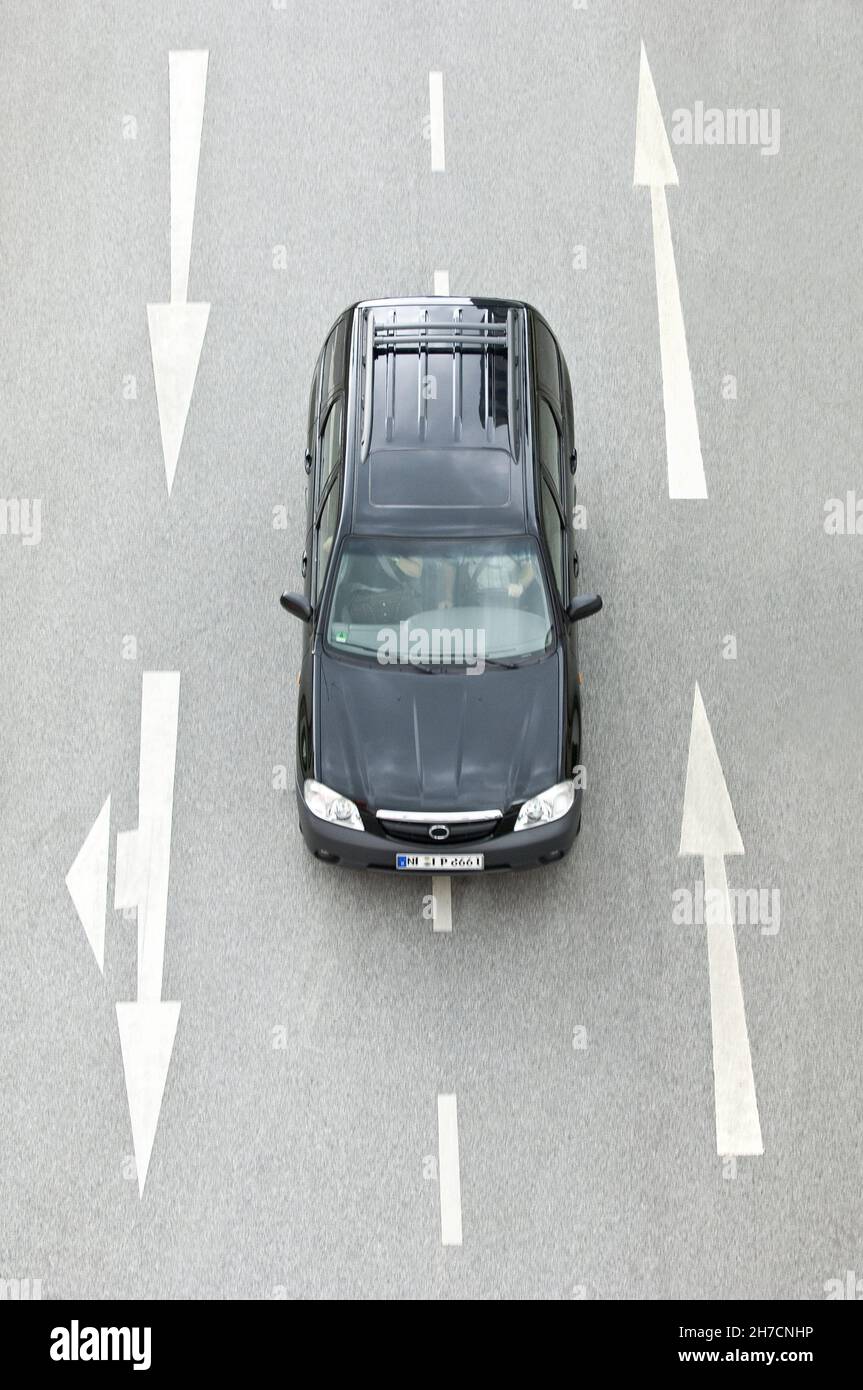 Car with road direction arrows hi-res stock photography and images - Alamy