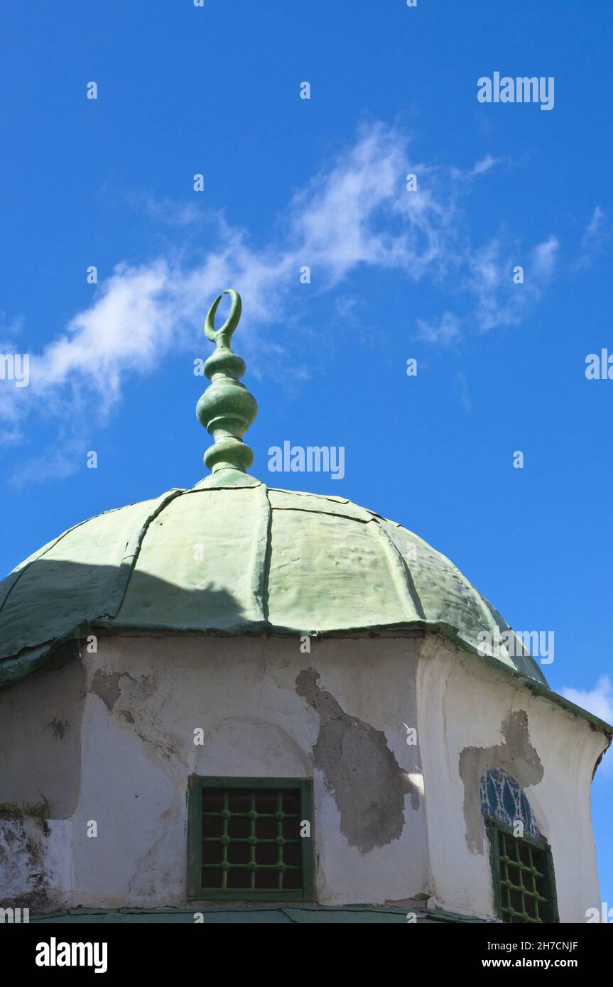 green roof of the sebil at the entrance to the Jazzar Pasha Mosque ...