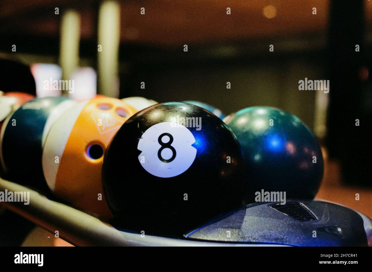 Closeup of the round black billiard ball with the number 8 Stock Photo ...