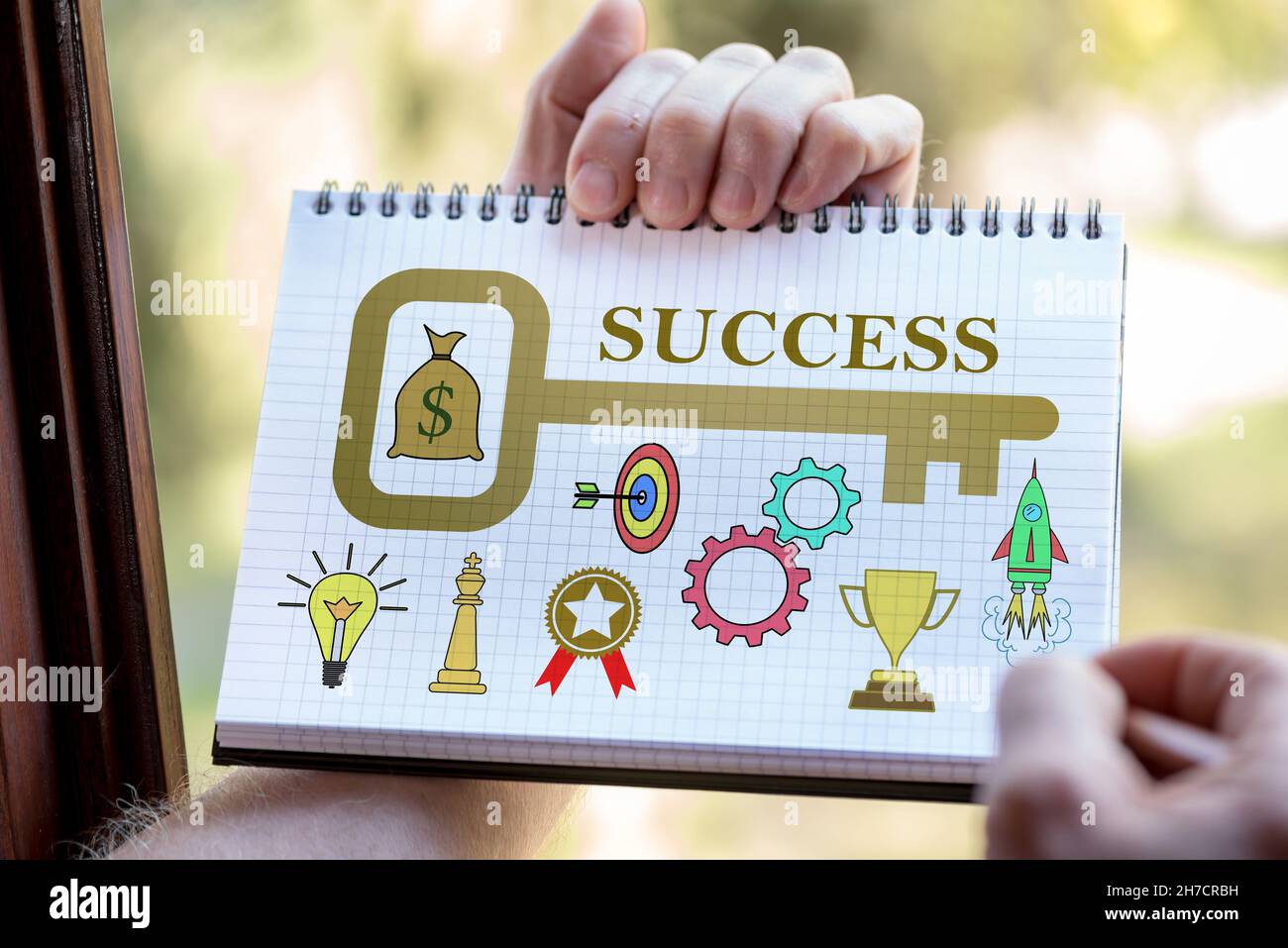Hand drawing business success concept on a notepad Stock Photo - Alamy