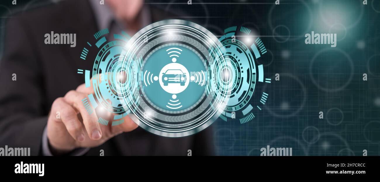 Man touching a smart car concept on a touch screen with his finger ...