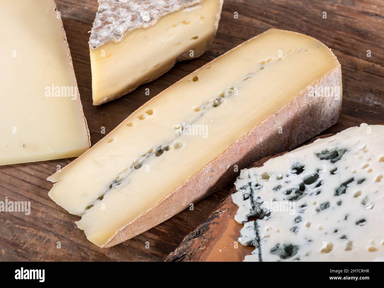 Composition with different varieties of French cheeses Stock Photo - Alamy