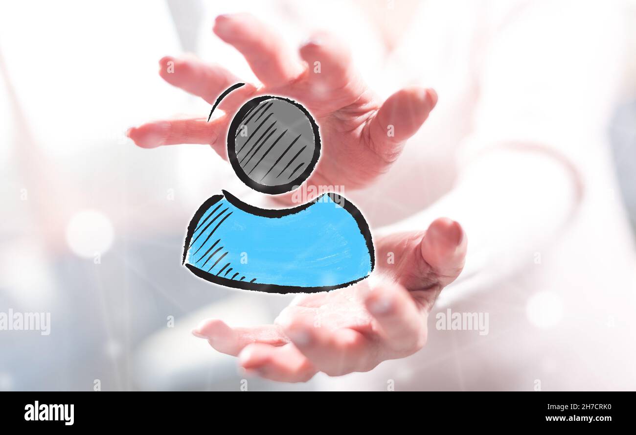 Profile concept between hands of a woman in background Stock Photo - Alamy