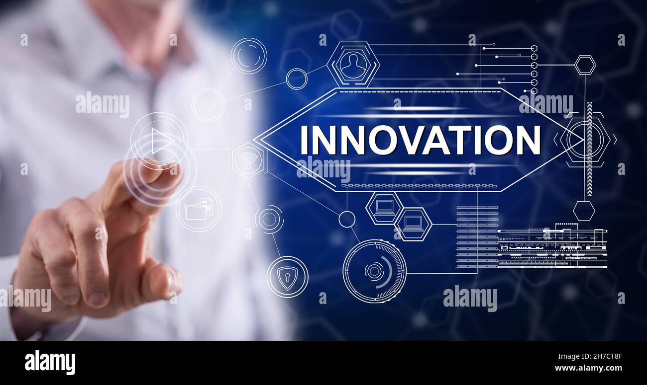 Man touching an innovation concept on a touch screen with his finger ...