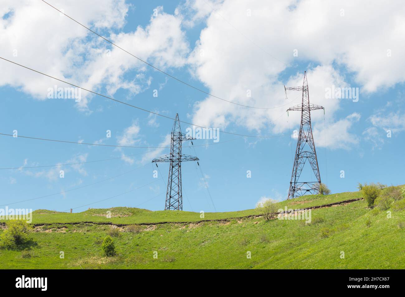 supports of a high-voltage power transmission line in mountainous rough ...