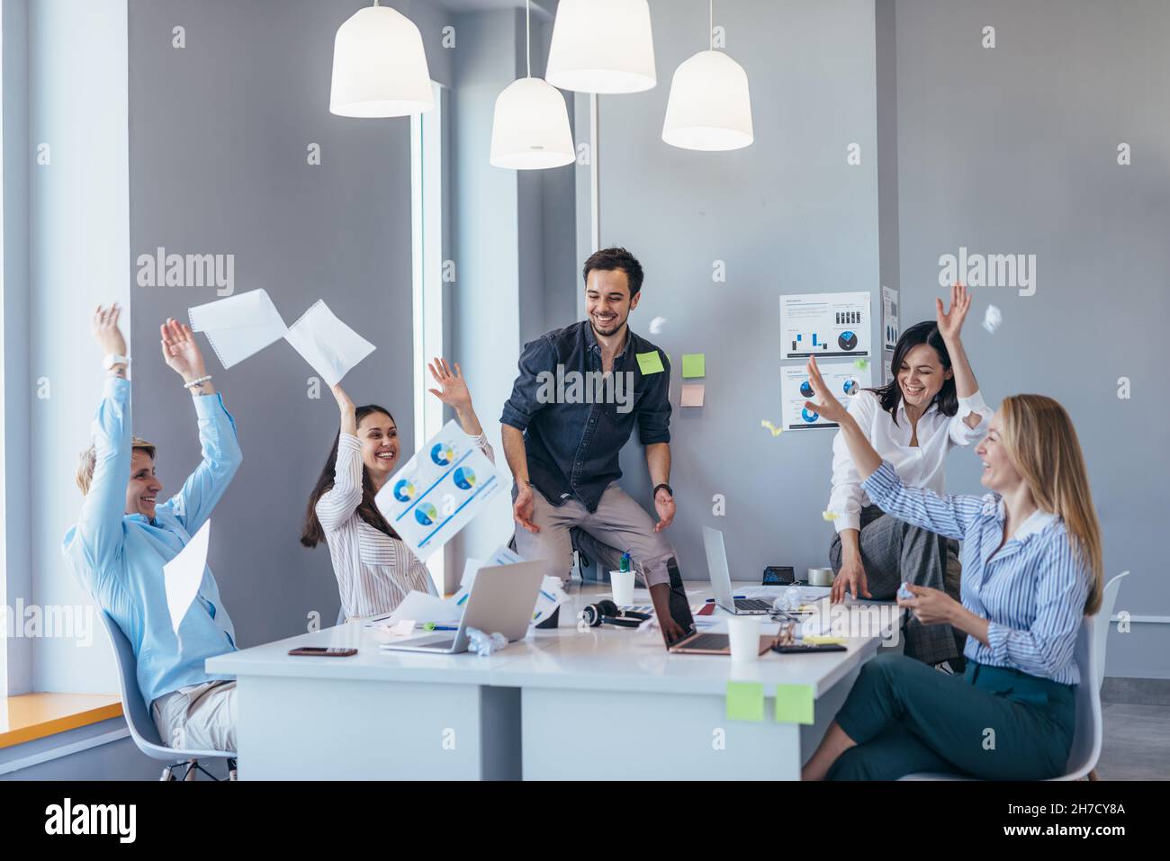 Business people celebrating and having fun in the office Stock Photo ...