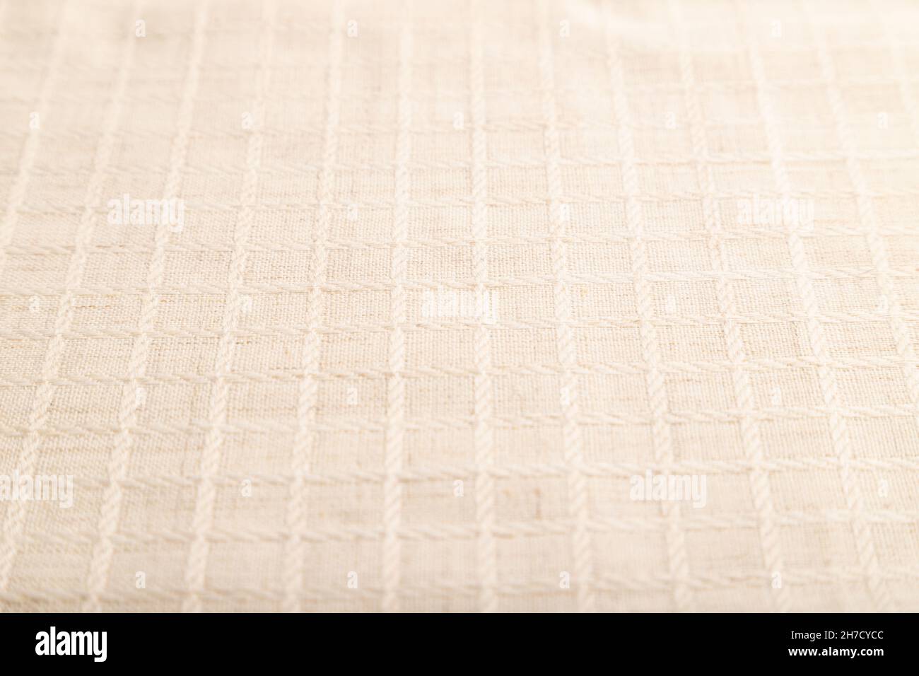 Fragment of smooth white linen tissue. Side view, natural textile ...