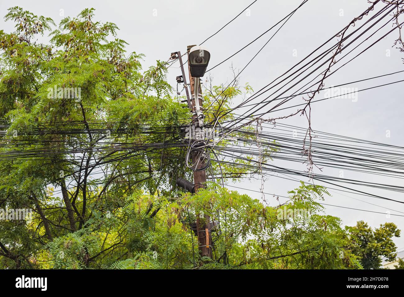 Messy cable arrangement of electric wire Stock Photo - Alamy
