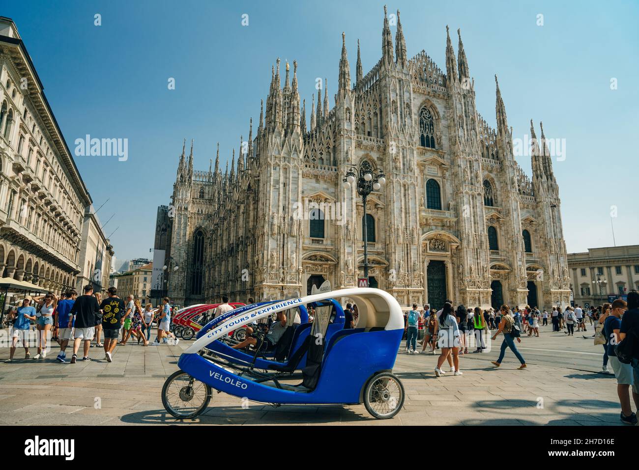 The Duomo-Cathedral symbol of Milan and busy square, Italy. High ...