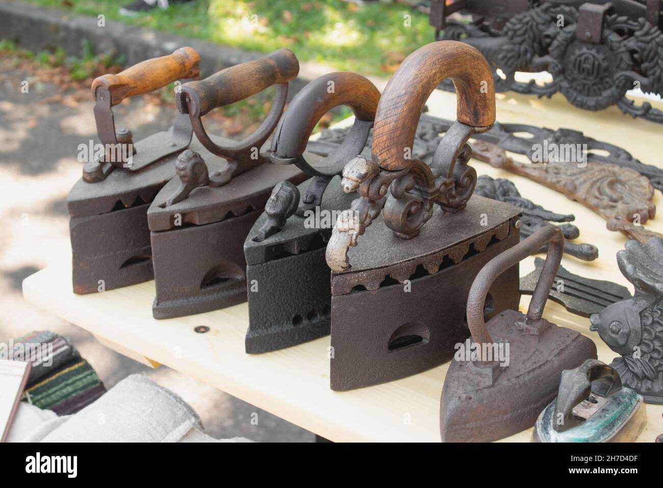 Antique metal coal irons and other vintage items on flea market or ...