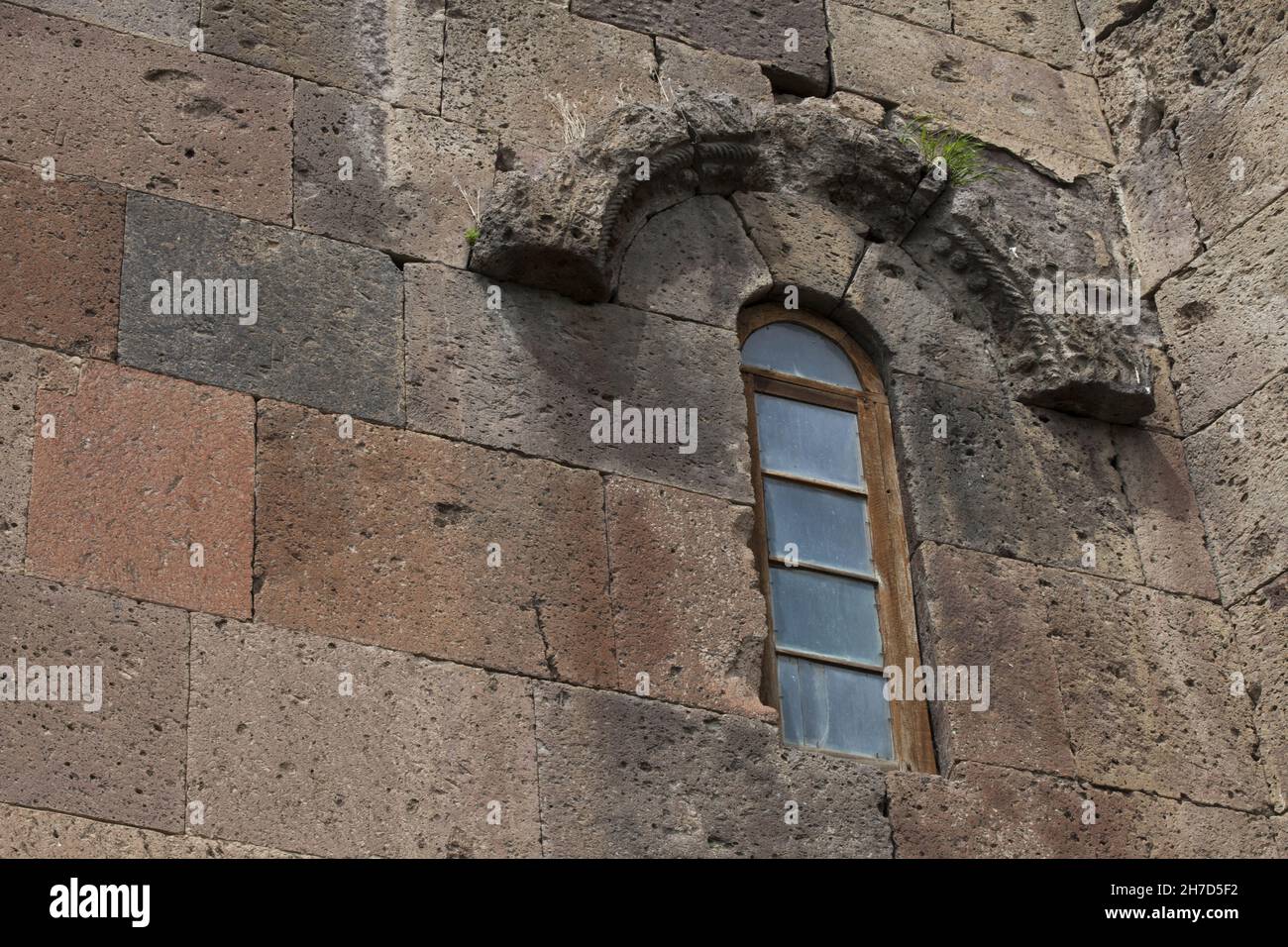 Old arched window in the stone wall Stock Photo - Alamy