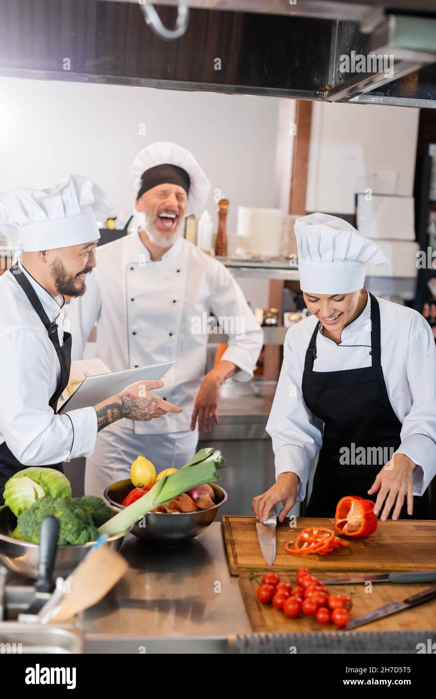 Woman chef holding slices hi-res stock photography and images - Alamy