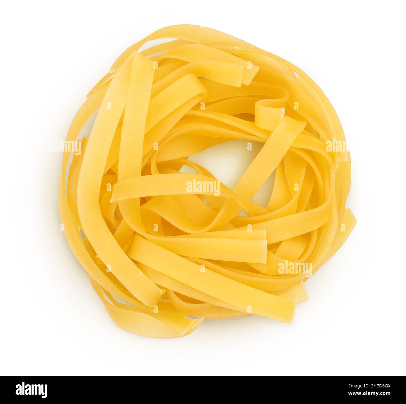 Raw tagliatelle pasta isolated on white background with clipping path ...