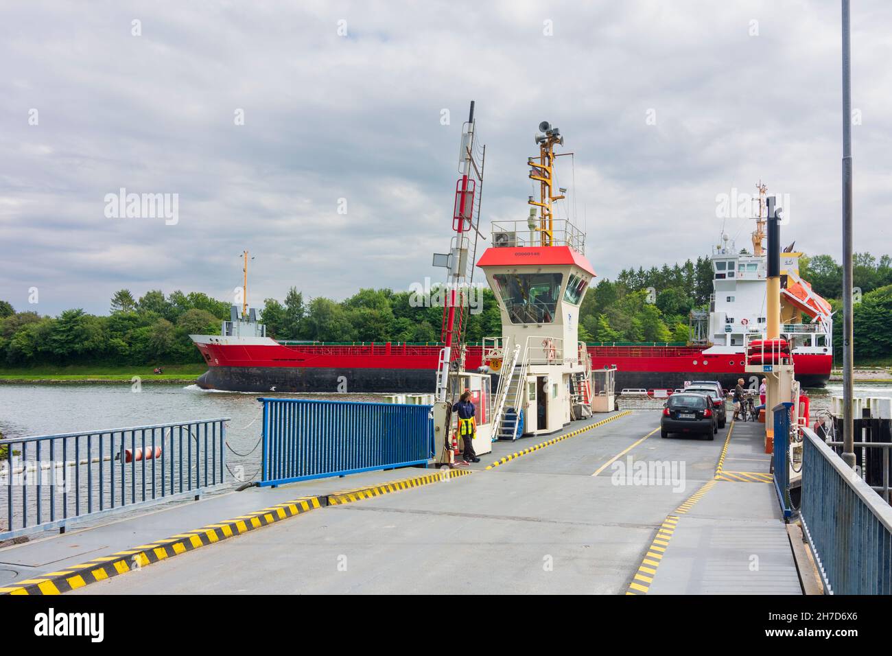 Quarnbek: ferry on Nord-Ostsee-Kanal (Kiel Canal) in Landwehr, crossing cargo ship in Binnenland ...