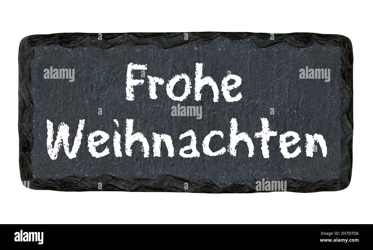 German Merry Christmas on slate board isolated against white background ...