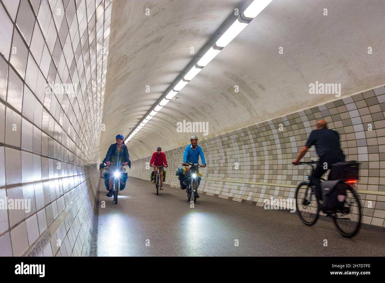 Rendsburg: cyclists in bicyle and pedestrian tunnel below Nord-Ostsee ...